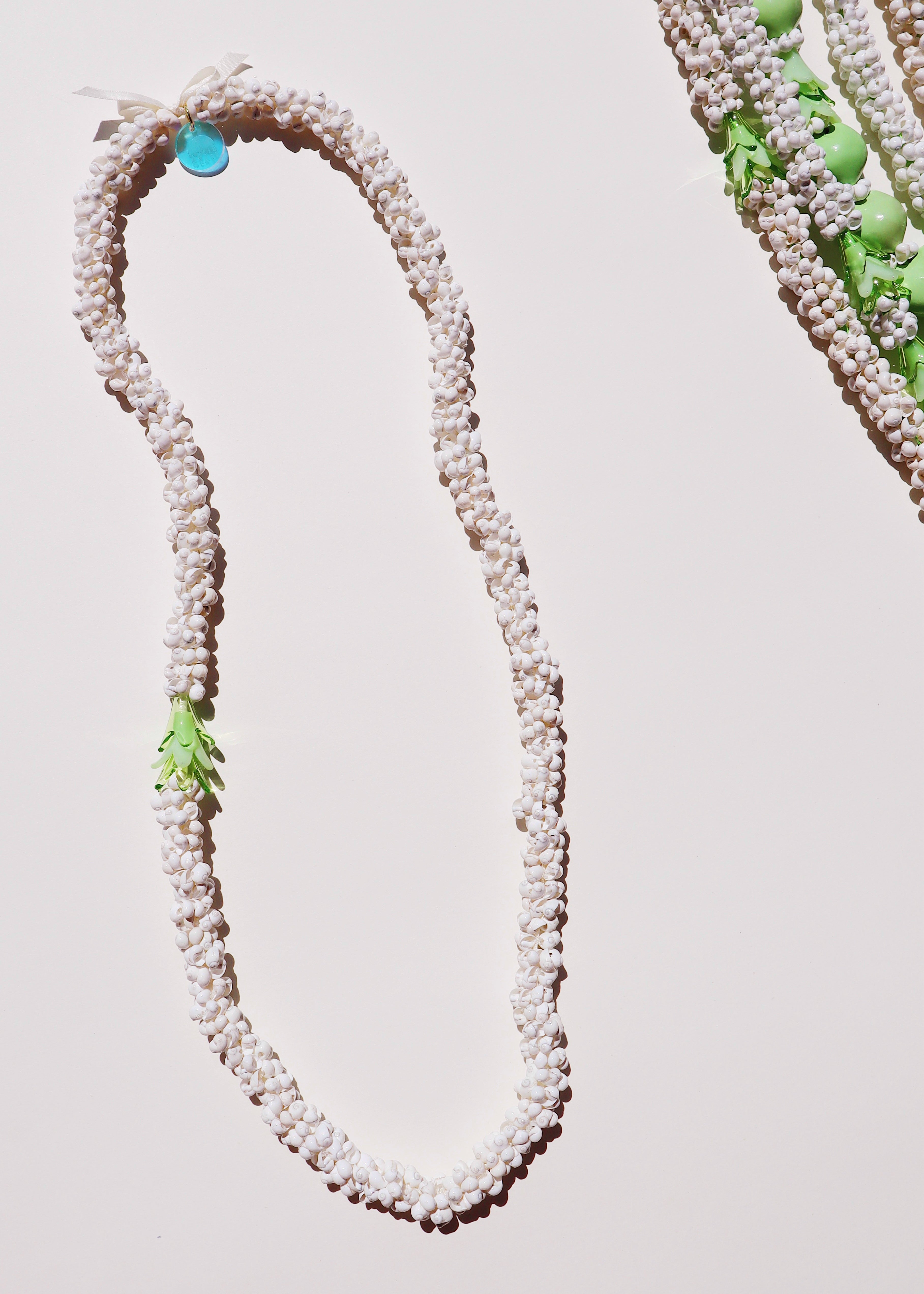 50% OFF - Pakalana Mongo Shell Lei with 3 Glass Pua – Arlie Pemberton