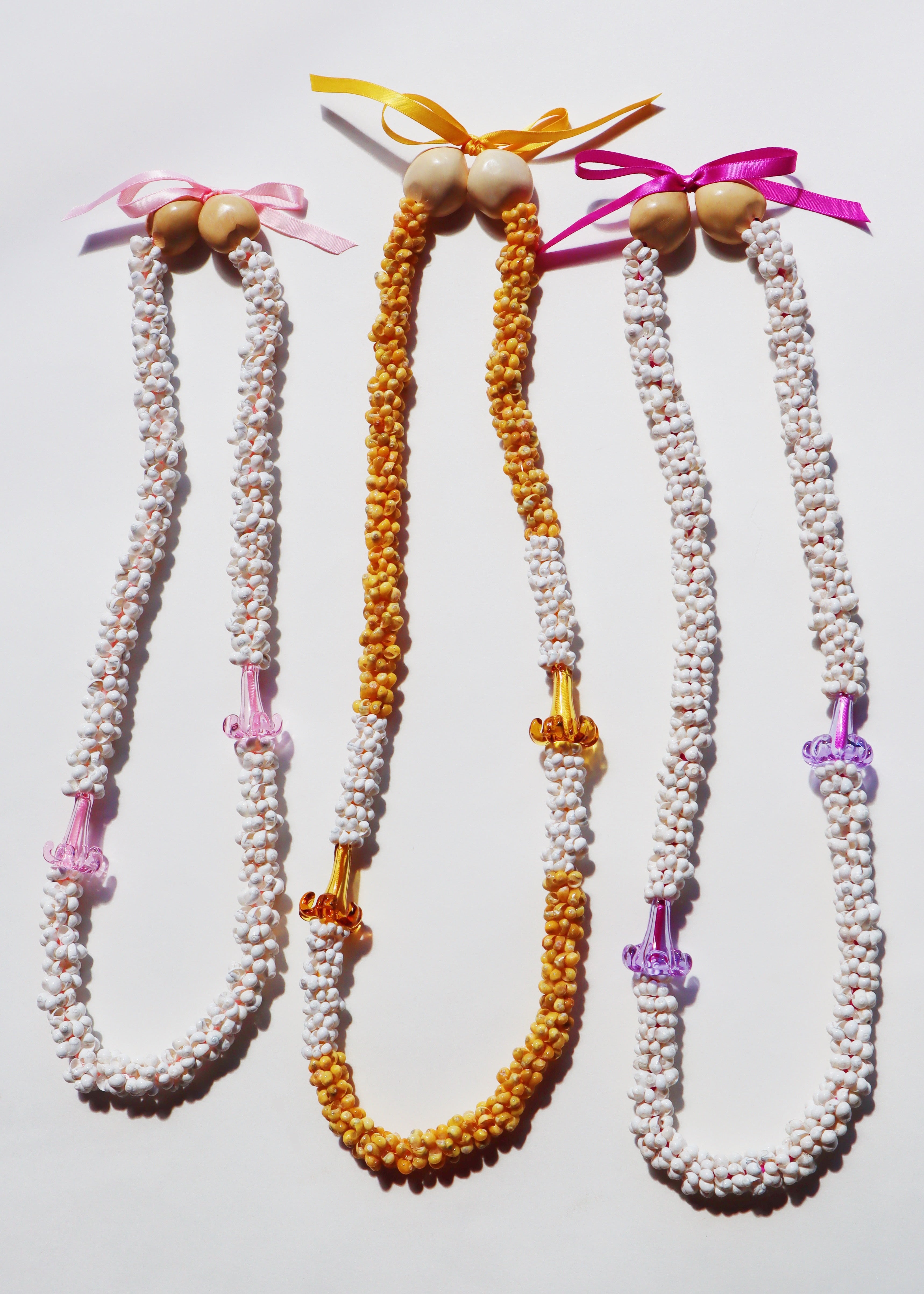 Puakenikeni Mongo Shell Lei with 2 Glass Pua – Arlie Pemberton